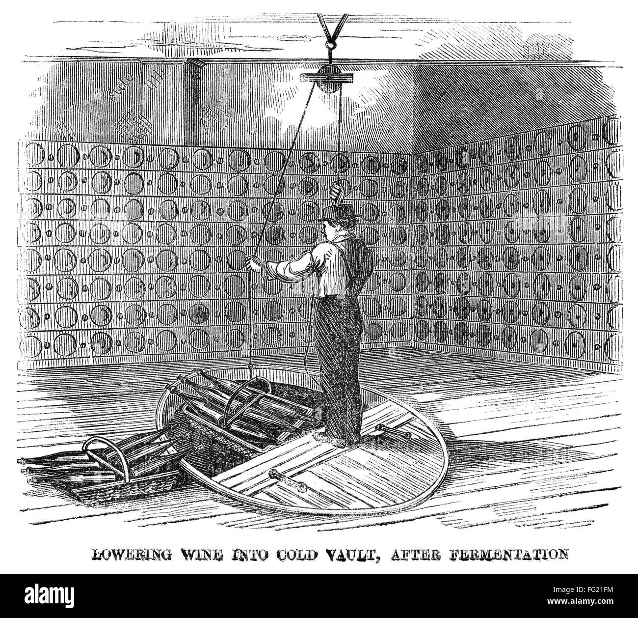 WINEMAKING: VAULT, 1866. /n'Lowering wine into cold vault, after ...