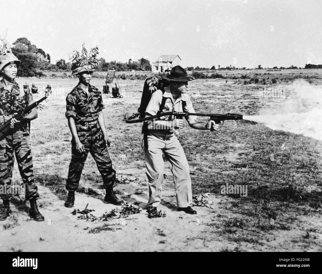 VIETNAM: AMERICAN ADVISOR. /nAn American military advisor demonstrating ...