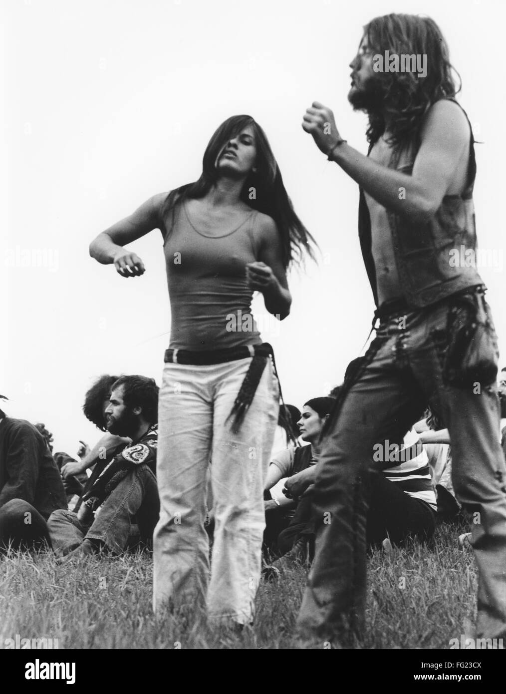 HIPPIE MOVEMENT, 1970. /nA hippie couple dances in the grass at the ...