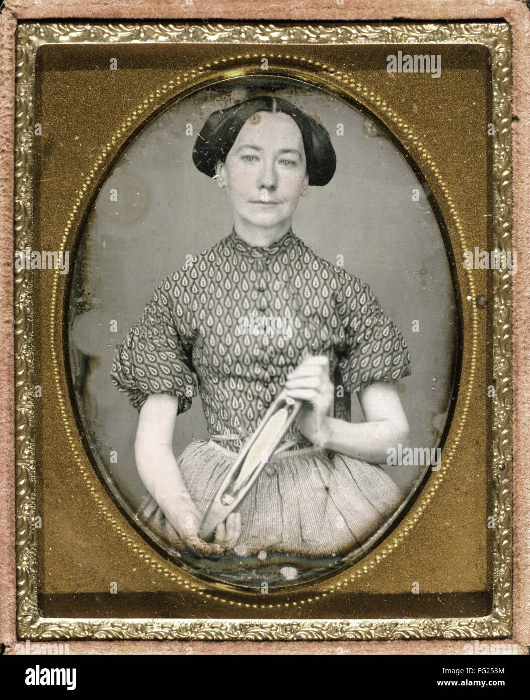 DAGUERREOTYPE: WOMAN. /nPortrait of Maria Boyd holding a weaving ...