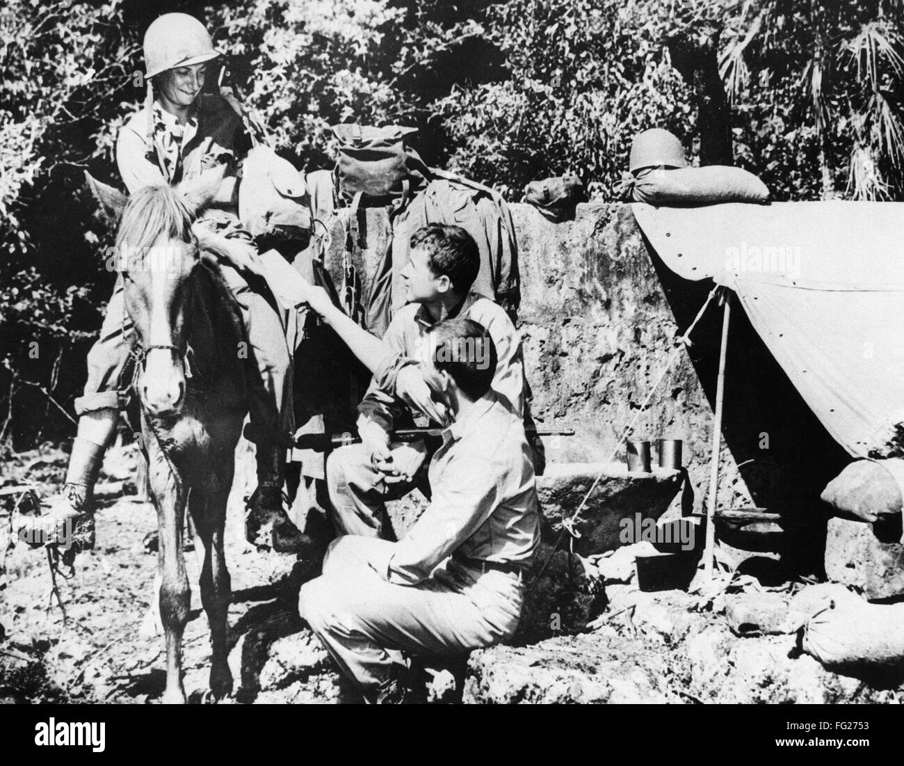 WWII: MAIL, 1945. /nU.S. Army mail clerk Corp. Jack Spring distributing ...