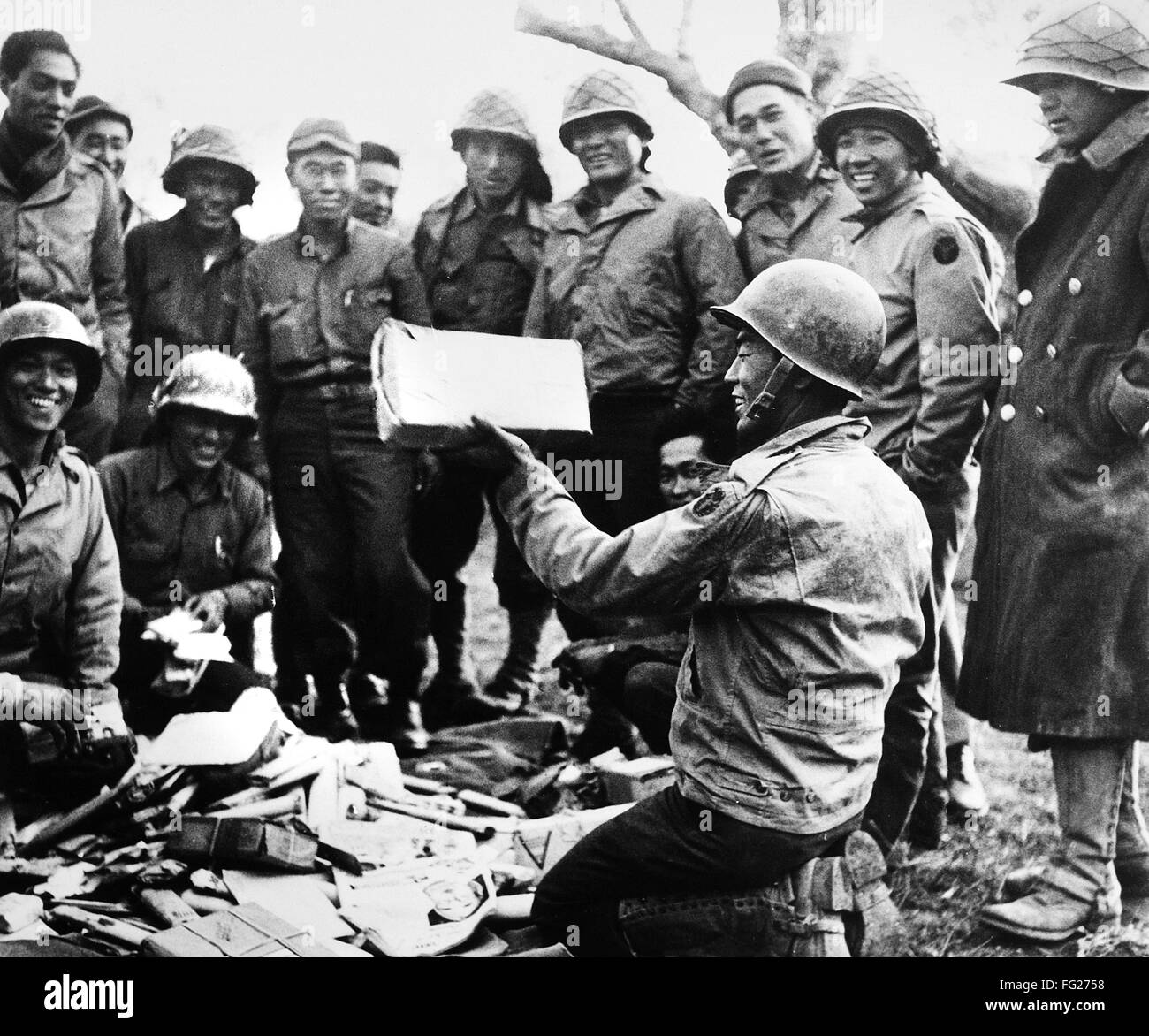 WWII: MAIL, 1942. /nJapanese American troops receiving mail at their ...
