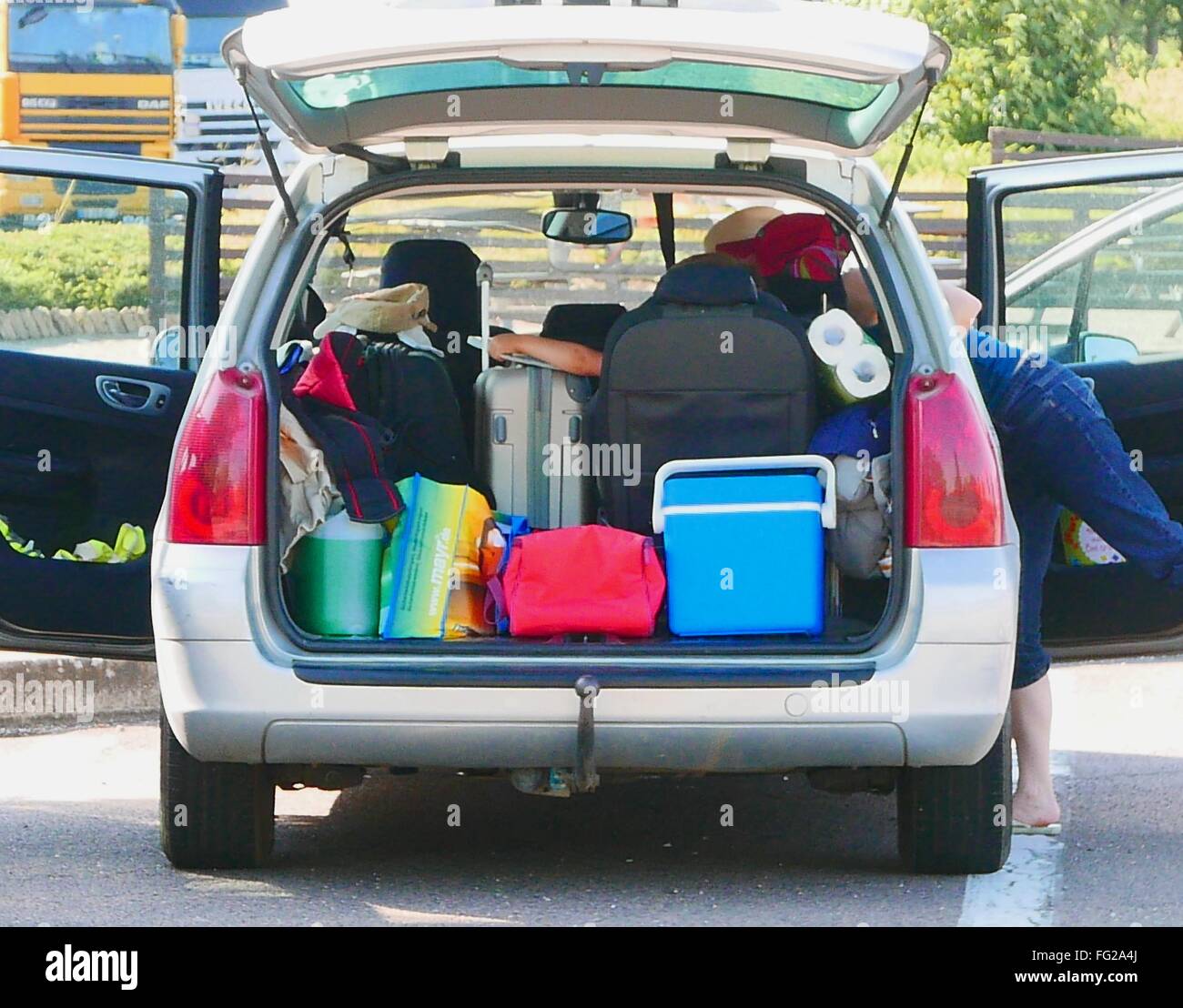Luggage In Car On Street Stock Photo - Alamy