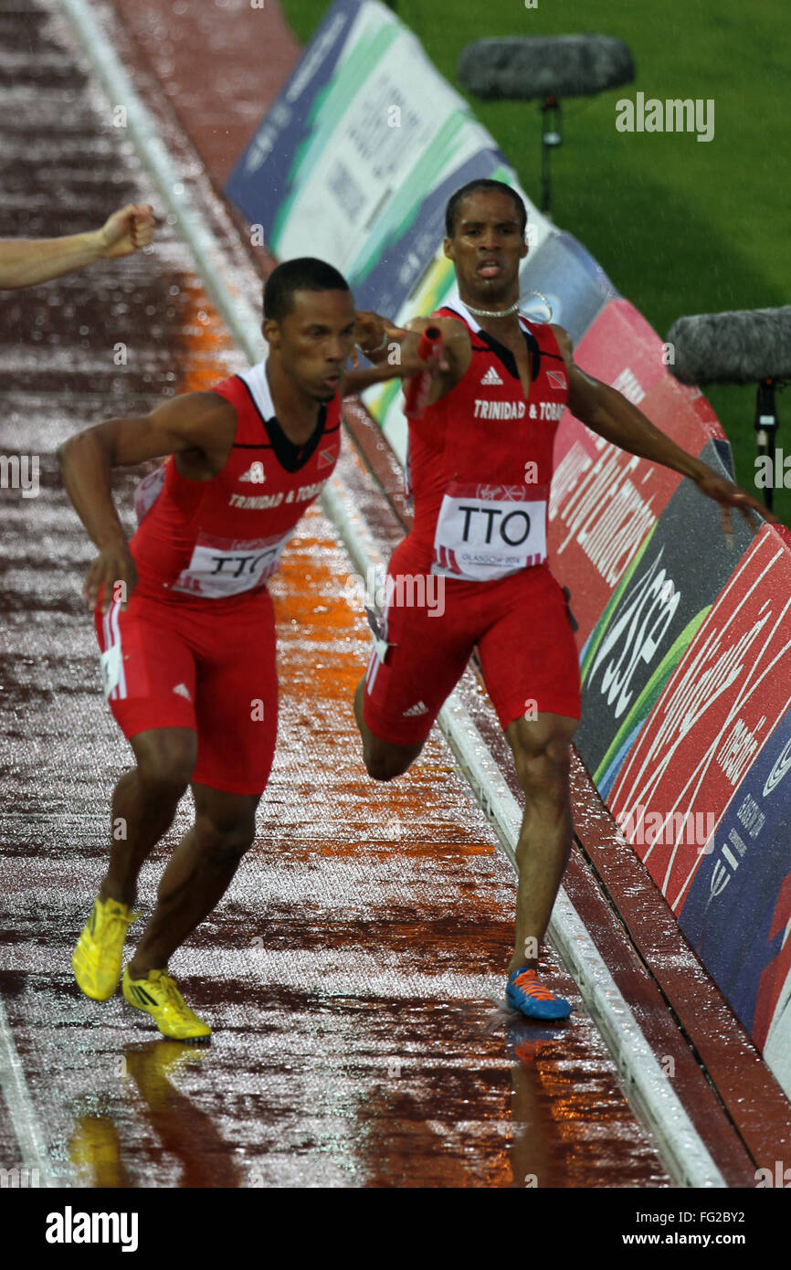 Renny QUOW passes the baton to Zwede HEWITT of Trinidad & Tobago in the ...