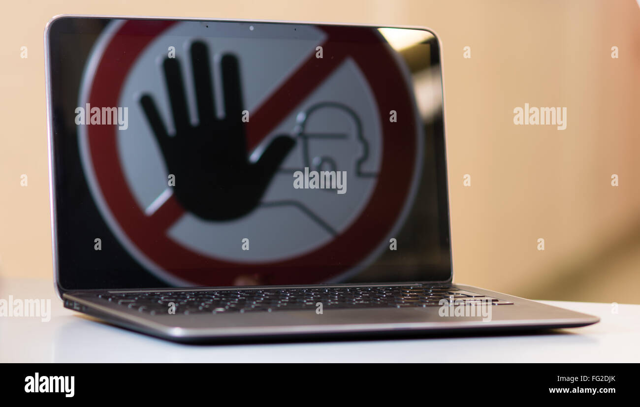 Stop sign in Notebook screen. Concept of stopping tinternet crime Stock ...