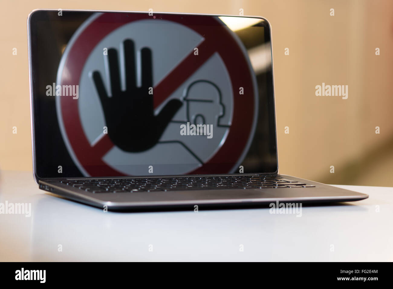 Stop sign in Notebook screen. Concept of stopping tinternet crime Stock ...