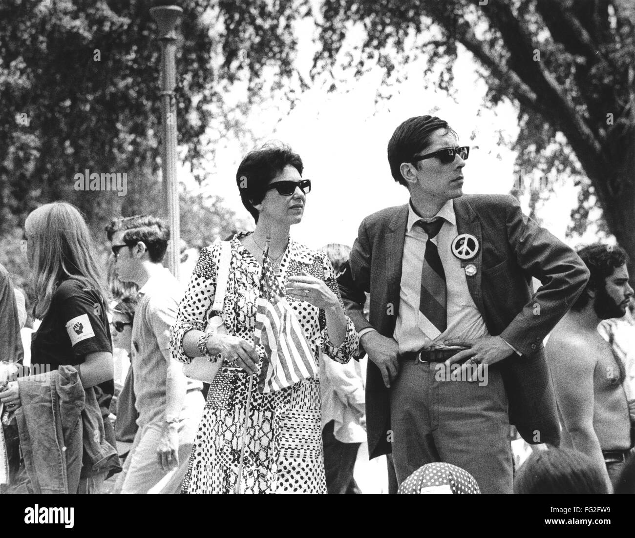 ANTI-WAR PROTEST, 1970. /nA young middle-class couple join thousands in ...