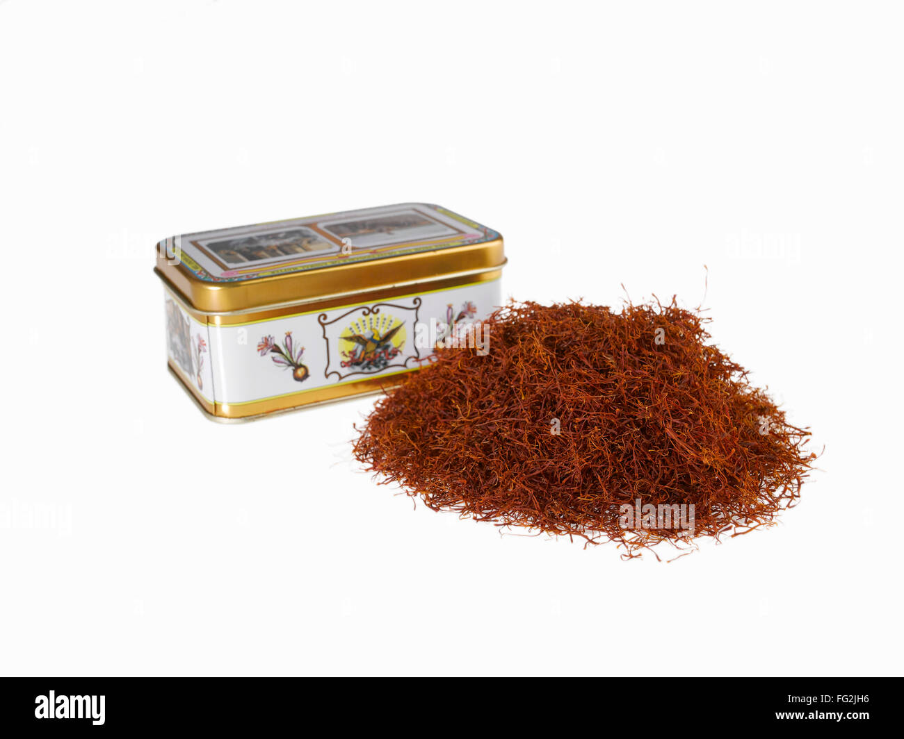 Spices ; saffron with metal container on white background Stock Photo ...