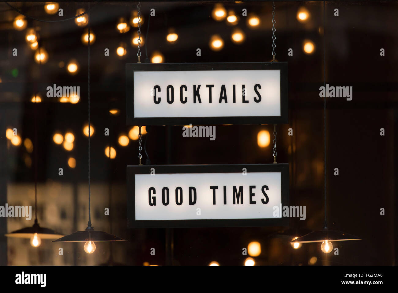 Cocktails good times sign Stock Photo - Alamy