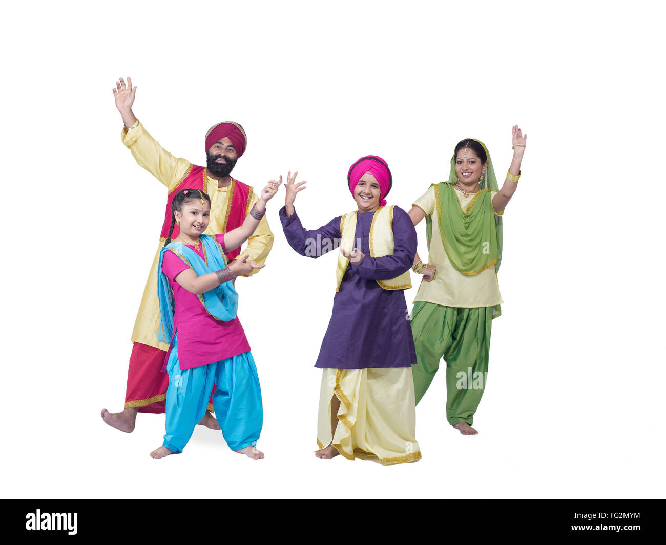 Sikh family performing folk dance bhangra MR#702X;702Y;702Z;779A Stock ...