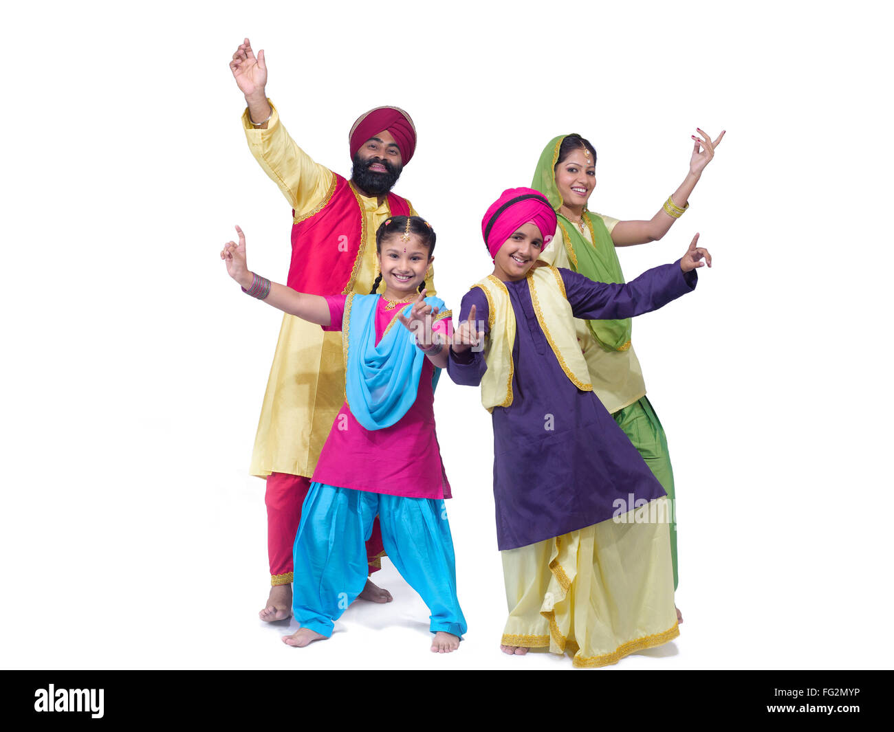 Sikh family performing dancing folk dance bhangra father mother son ...