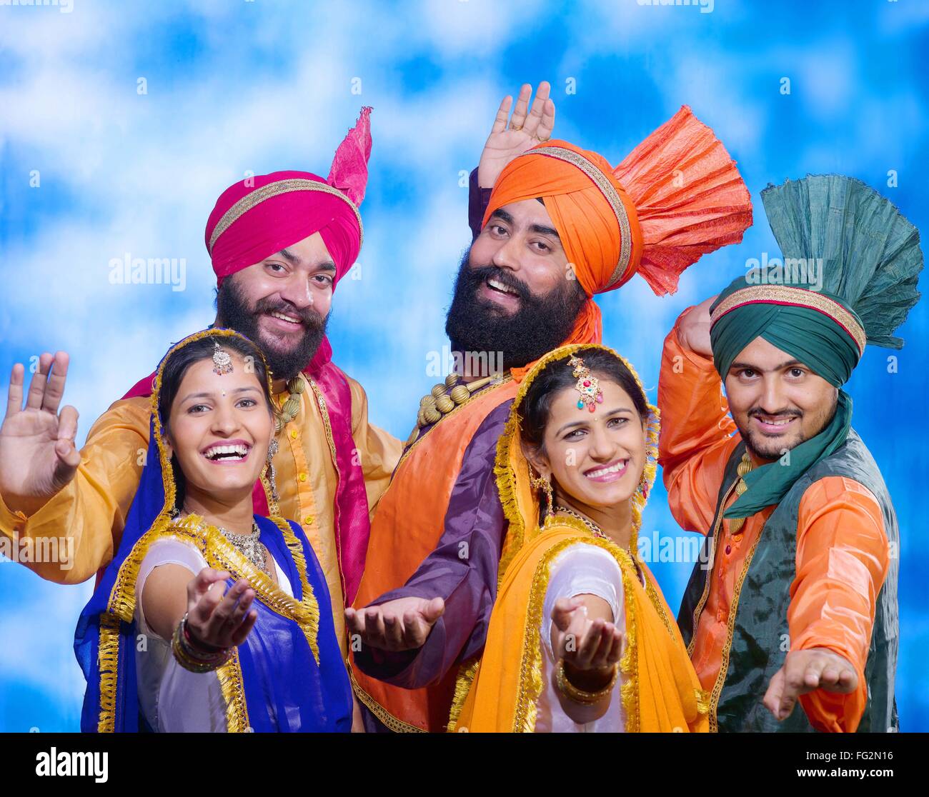 Dancers performing folk dance bhangra MR#779B;779C;779D;779E;779F Stock ...
