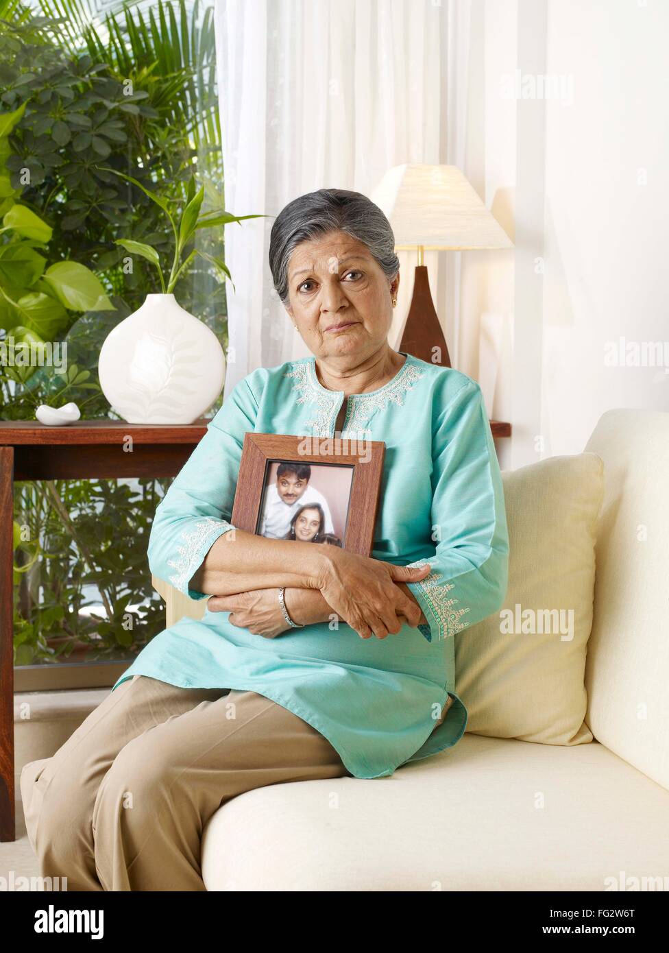 Sad old woman drawing hi-res stock photography and images - Alamy