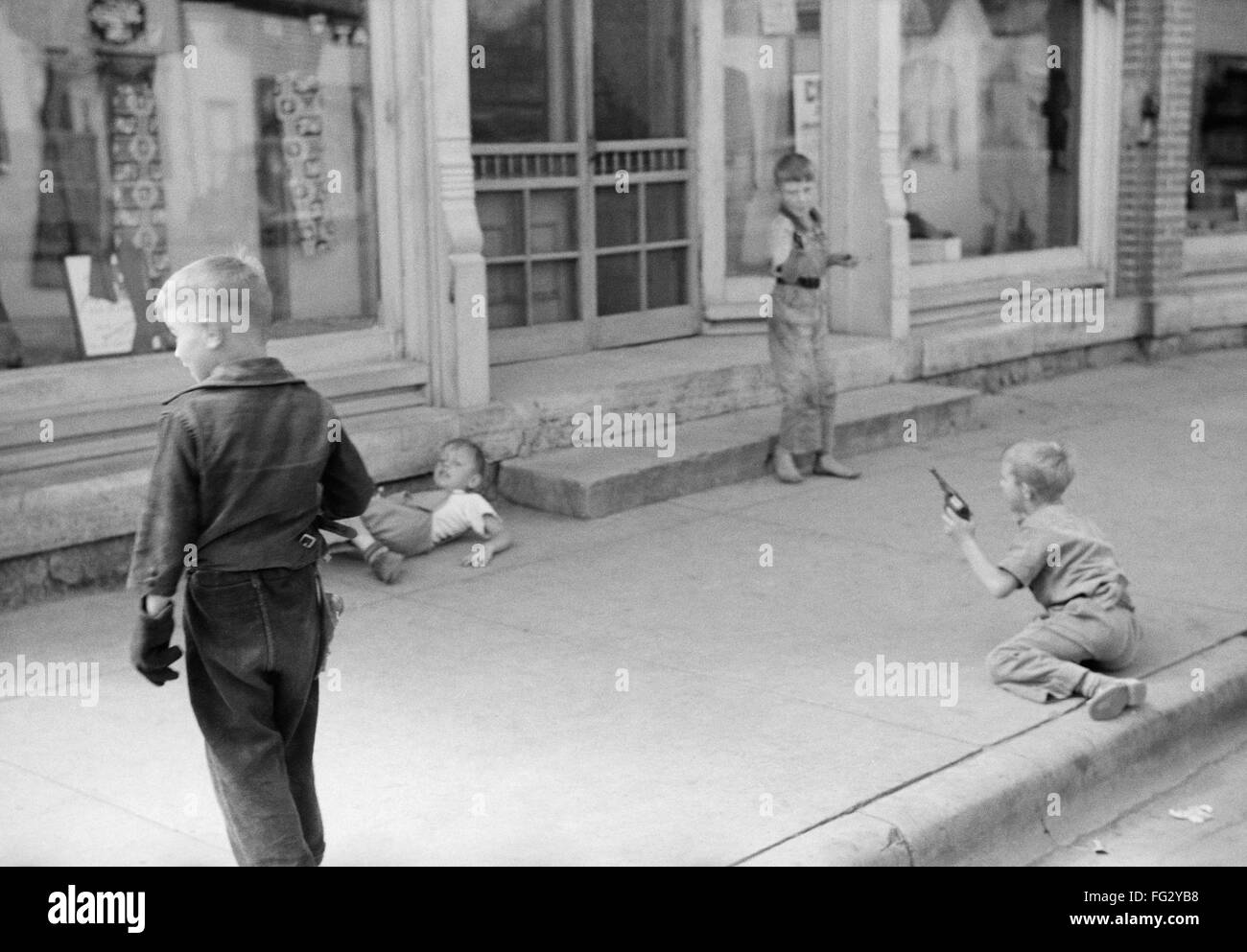GUN FIGHT, 1939. /nBoys having a toy gun fight in Boscobel, Wisconsin ...