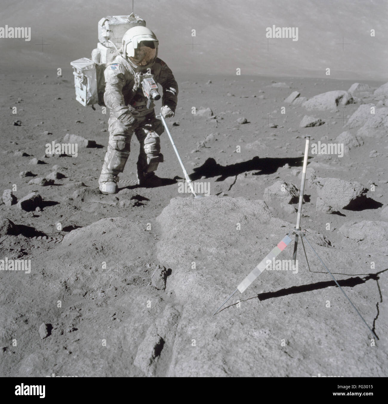 APOLLO 17: MOON, 1972. /nAstronaut Harrison Schmitt gathering lunar samples during the second ...