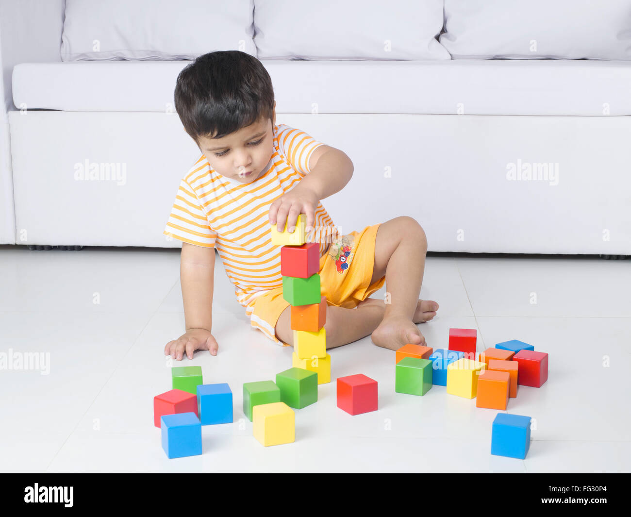 Indian children playing blocks hi-res stock photography and images - Alamy