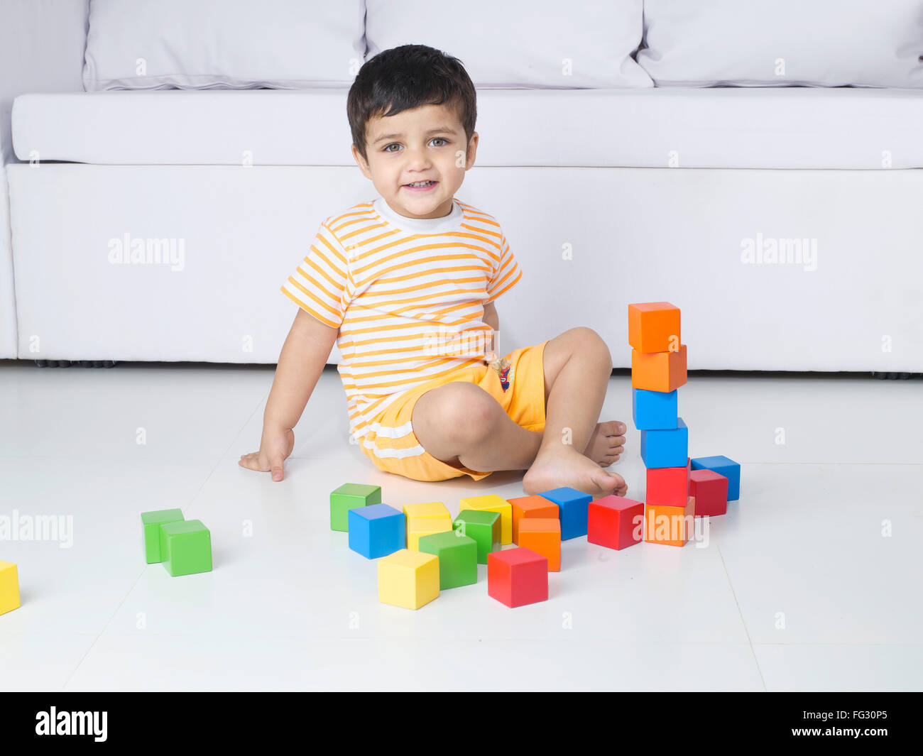 Indian children playing blocks hi-res stock photography and images - Alamy