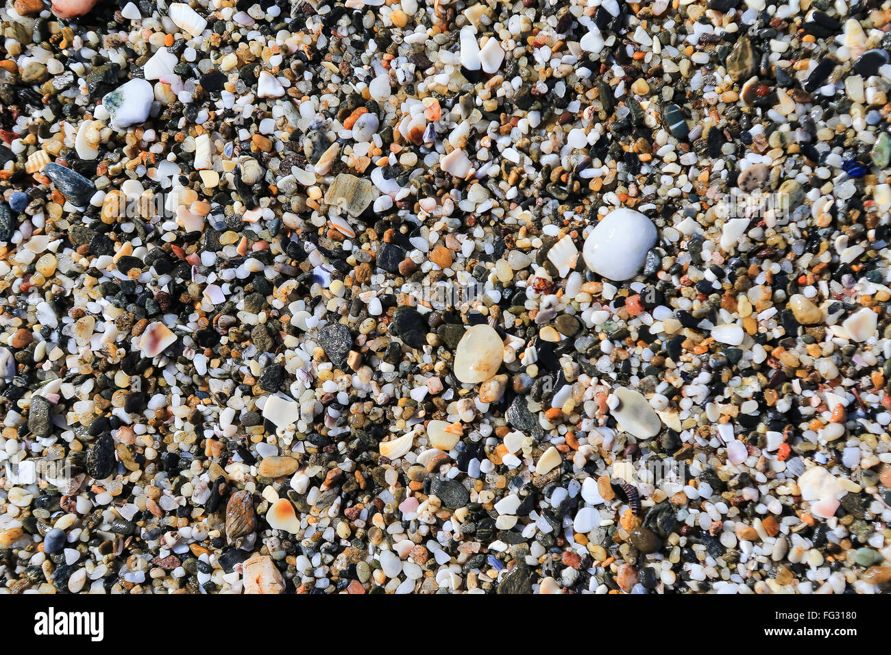 Small sea pebbles background Stock Photo - Alamy