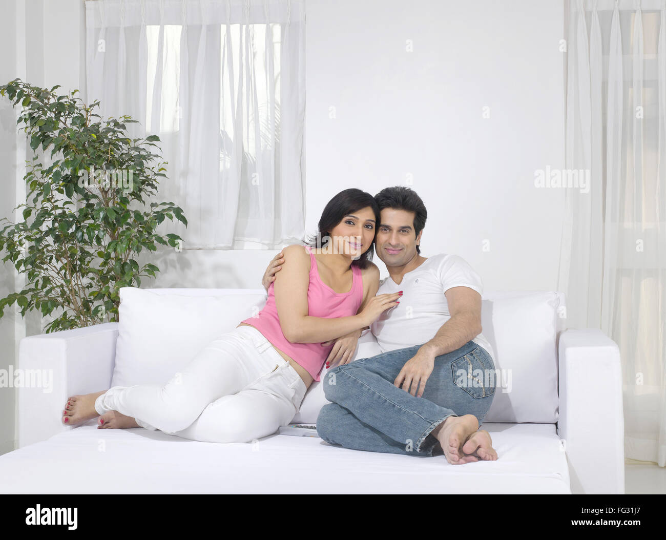 Couple embracing sitting close to each other ; MR#779L ; MR#779M Stock ...