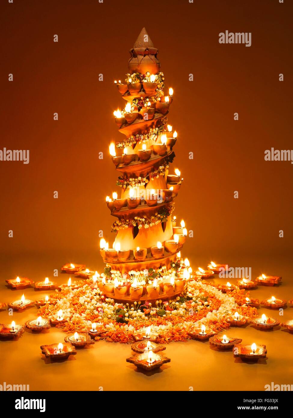 Diyas and flowers arrangement for diwali festival ; India Stock Photo ...