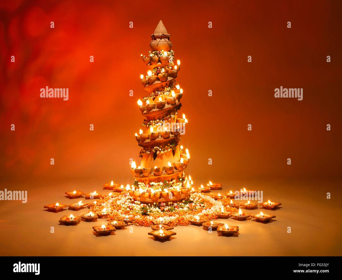 Diyas and flowers arrangement for diwali festival ; India Stock Photo ...