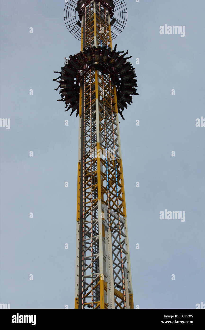 fairground funfair ride moving fast fair lights Night colours of the ...