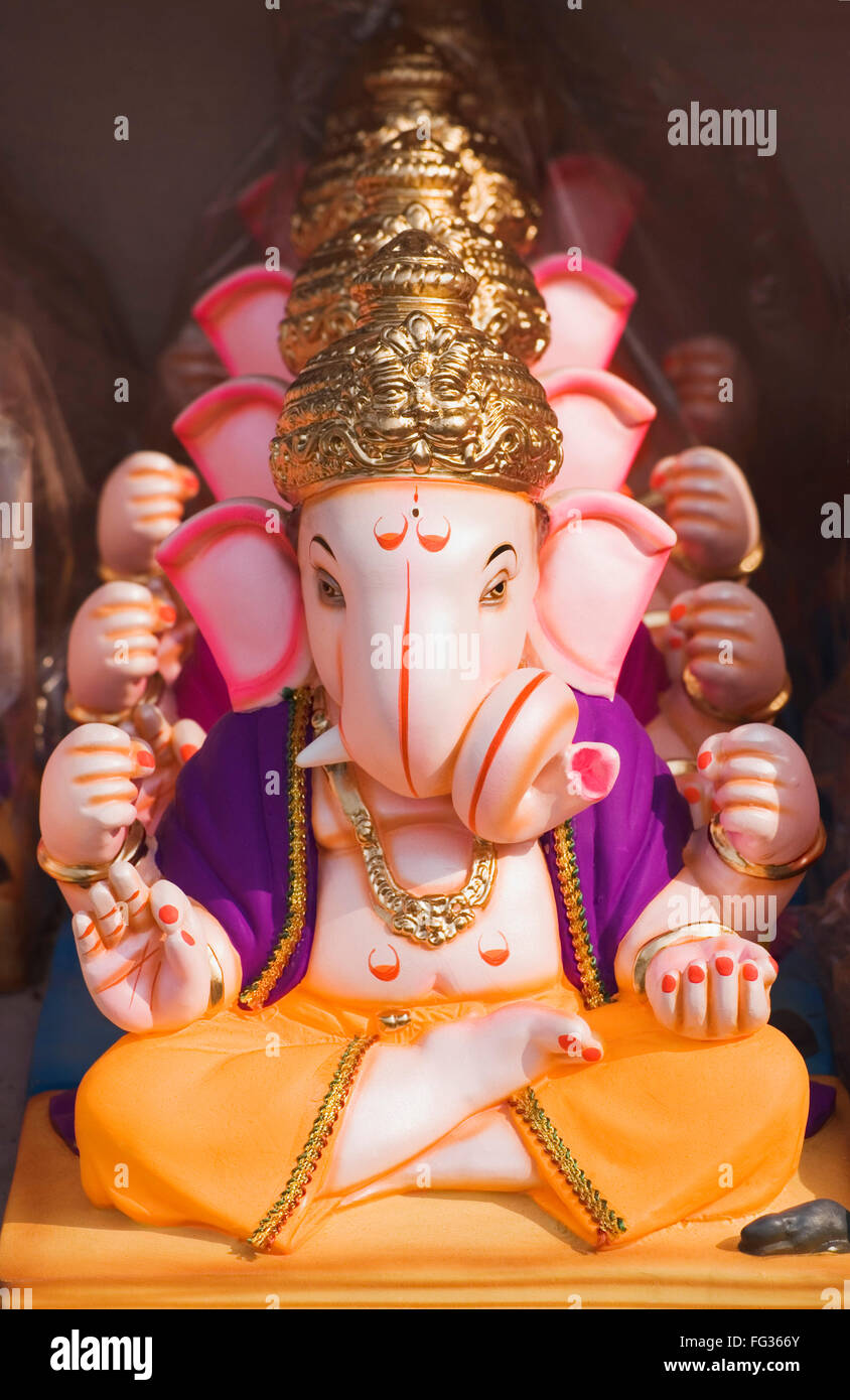 Idols of ganesh elephant headed god put one behind other for sale in ...