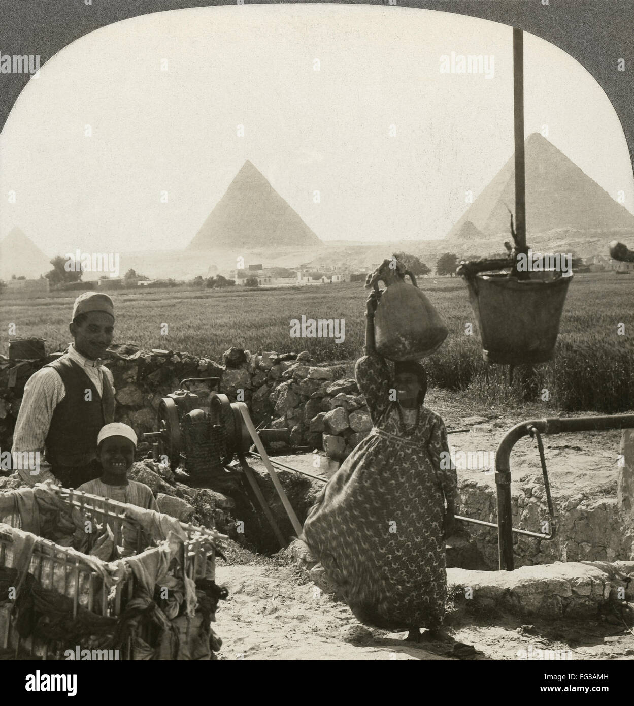 EGYPT: PUMPING WATER, c1920. /n'The old and new in Egypt - a water ...