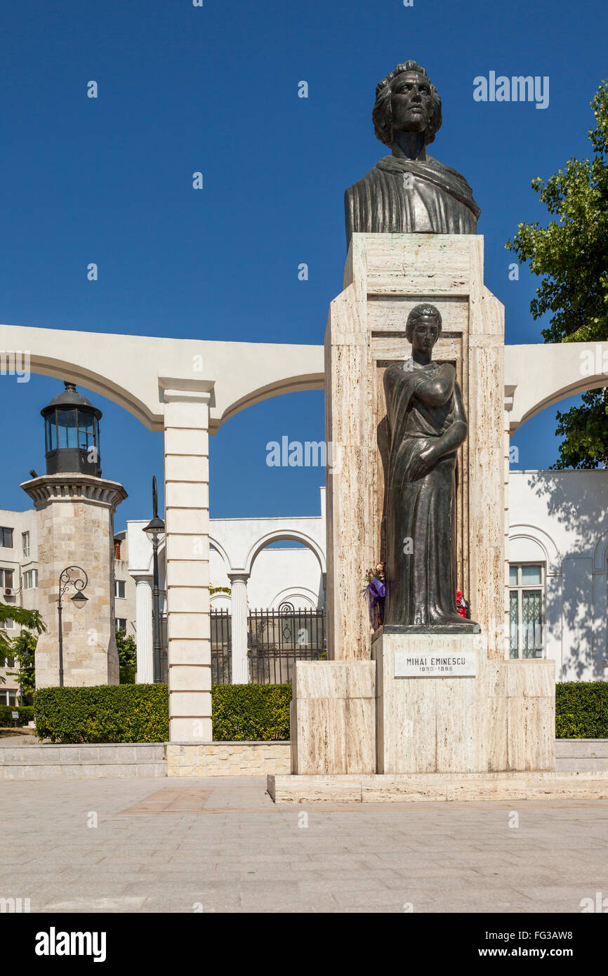 Statue of Mihai Eminescu and the Genoese lighthouse, Constanta, Romania ...