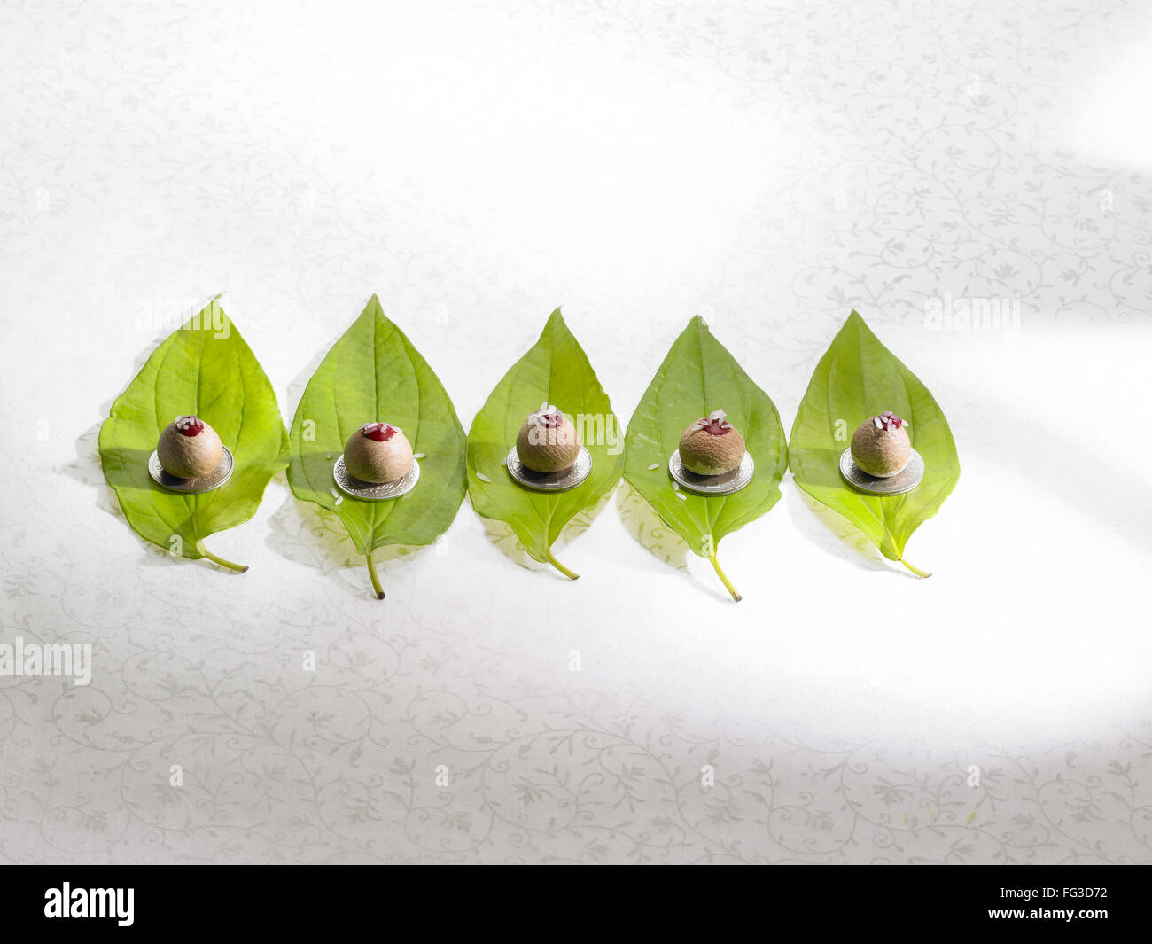 Areca nut and betel leaf High Resolution Stock Photography and Images ...