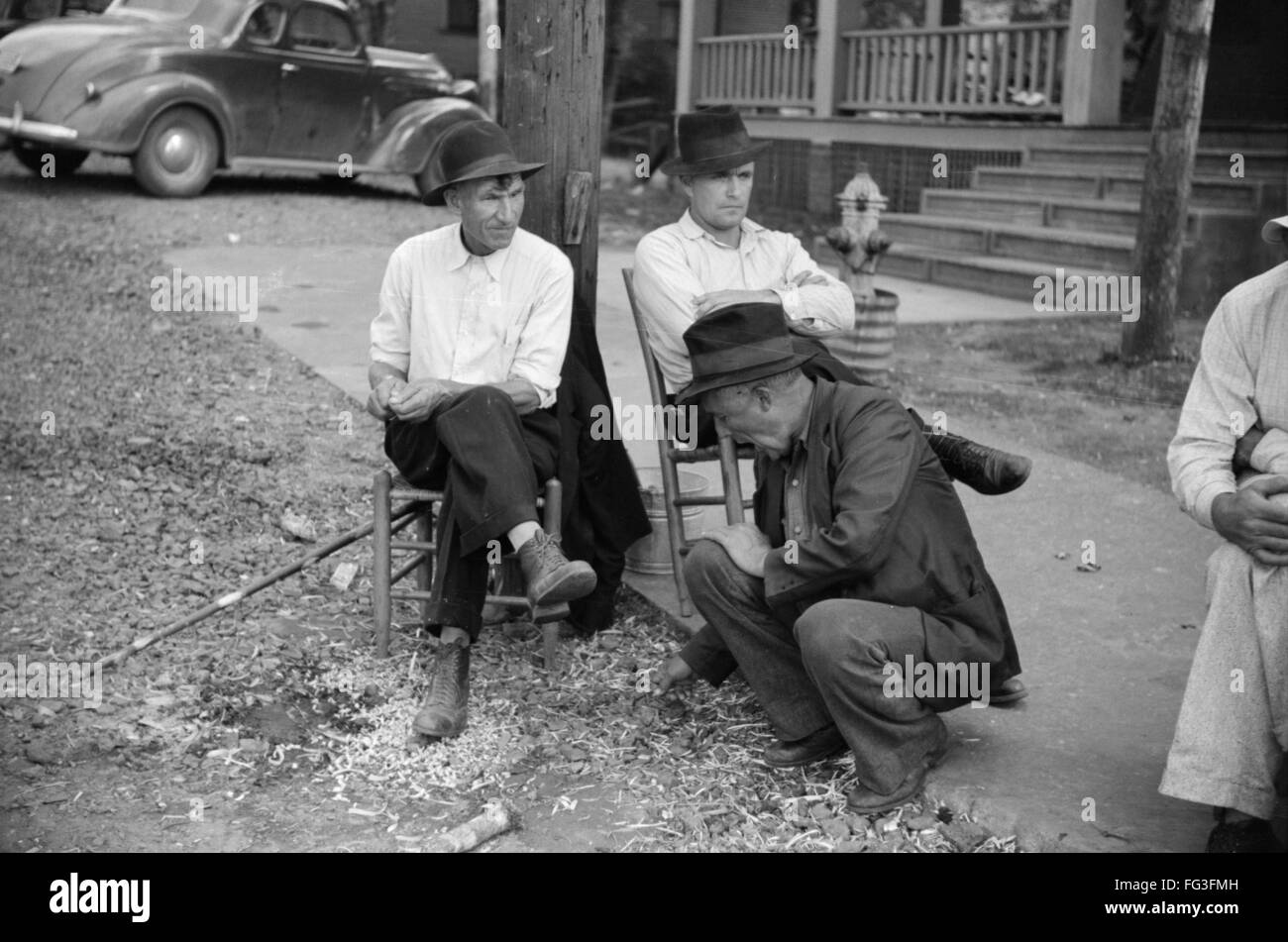 MINER STRIKE, 1939./nStriking copper miners waiting for scabs to come ...