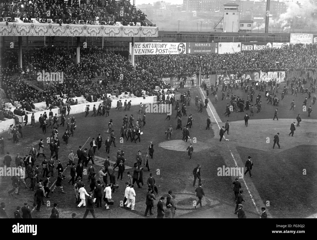 WORLD SERIES, 1913. /nFans on the field after the third game between ...