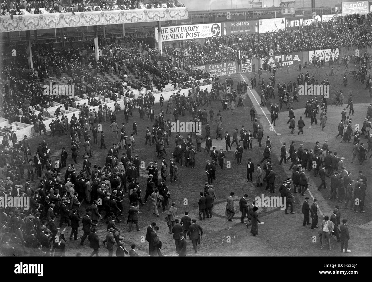 WORLD SERIES, 1913. /nFans on the field after the third game between ...