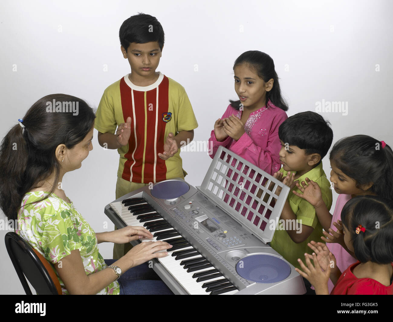 Students singing clapping hi-res stock photography and images - Alamy