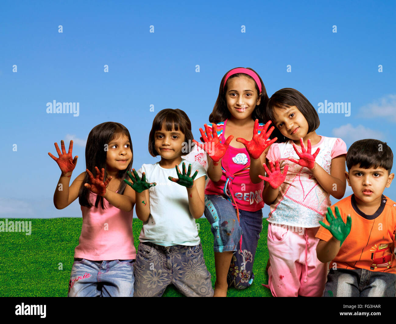 Children showing painted hand palms MR Stock Photo - Alamy