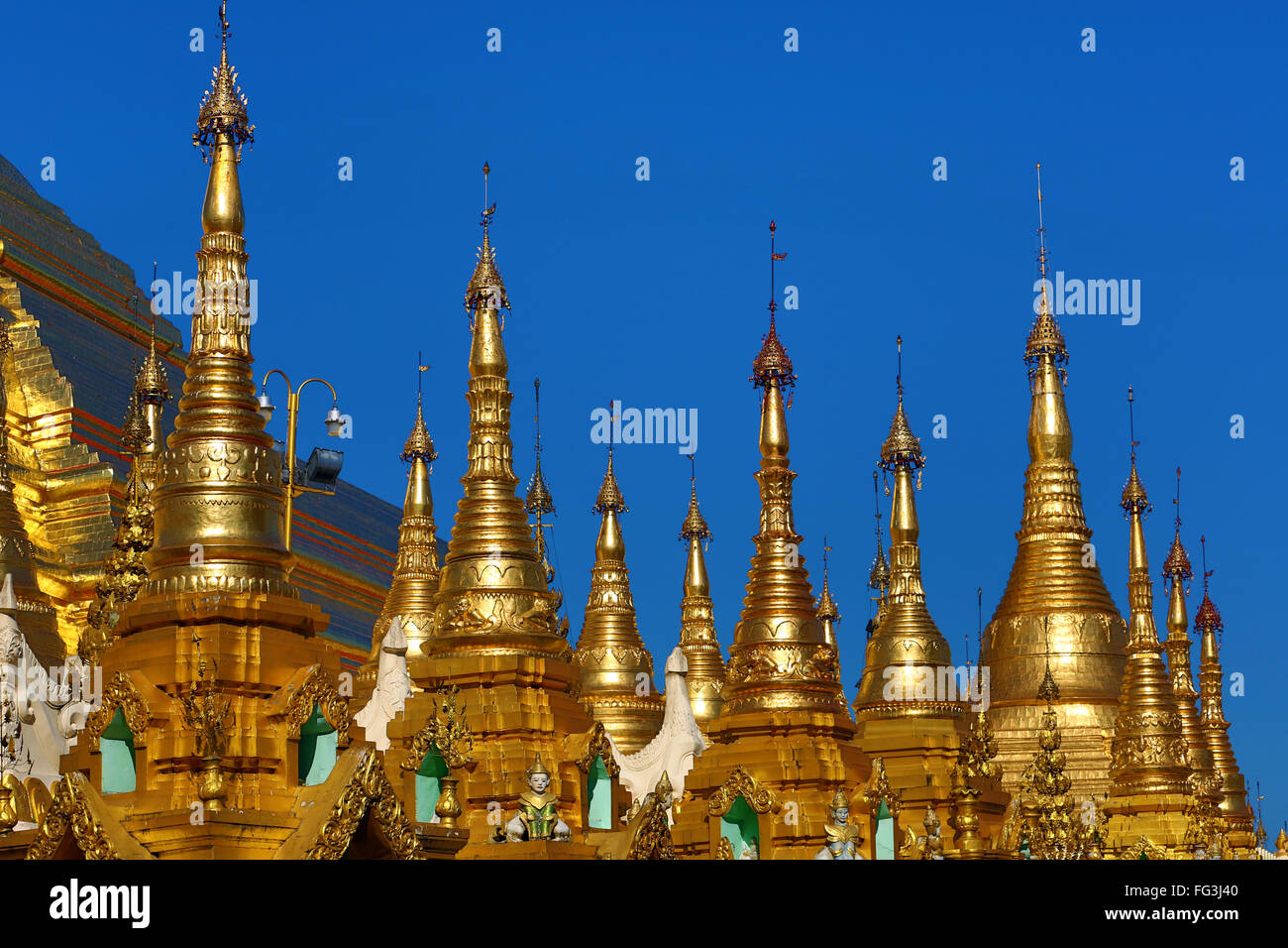 Gold stupa and spires at the Shwedagon Pagoda, Yangon, Myanmar Stock ...