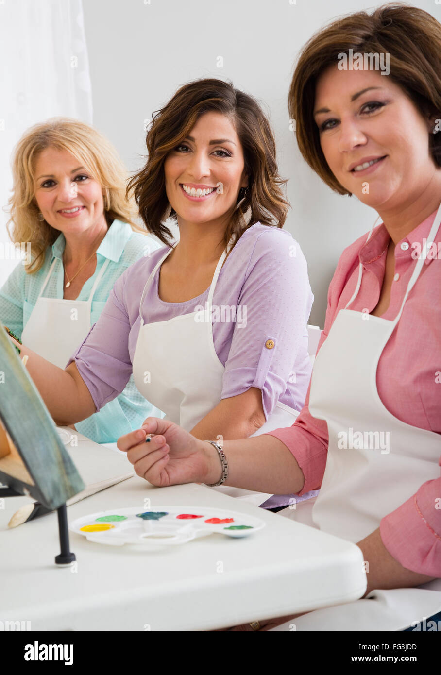 Three women smiles hi-res stock photography and images - Alamy
