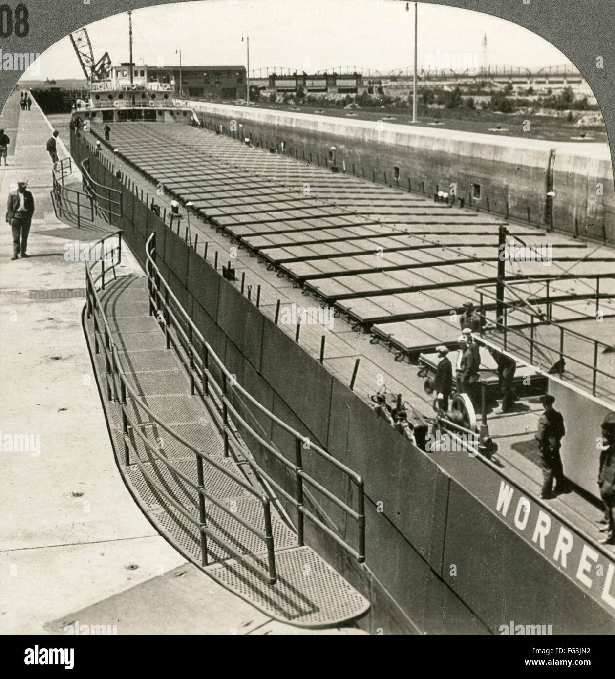 MICHIGAN: SOO LOCKS, c1920. /nA large iron ore ship coming through the ...