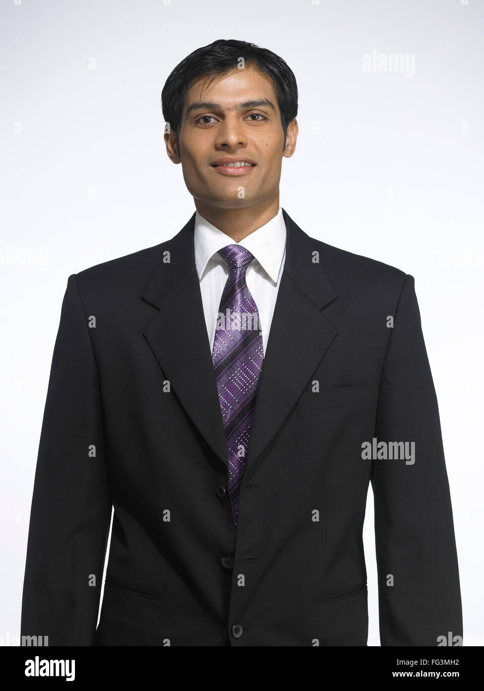 South Asian Indian executive man standing in style MR Stock Photo - Alamy