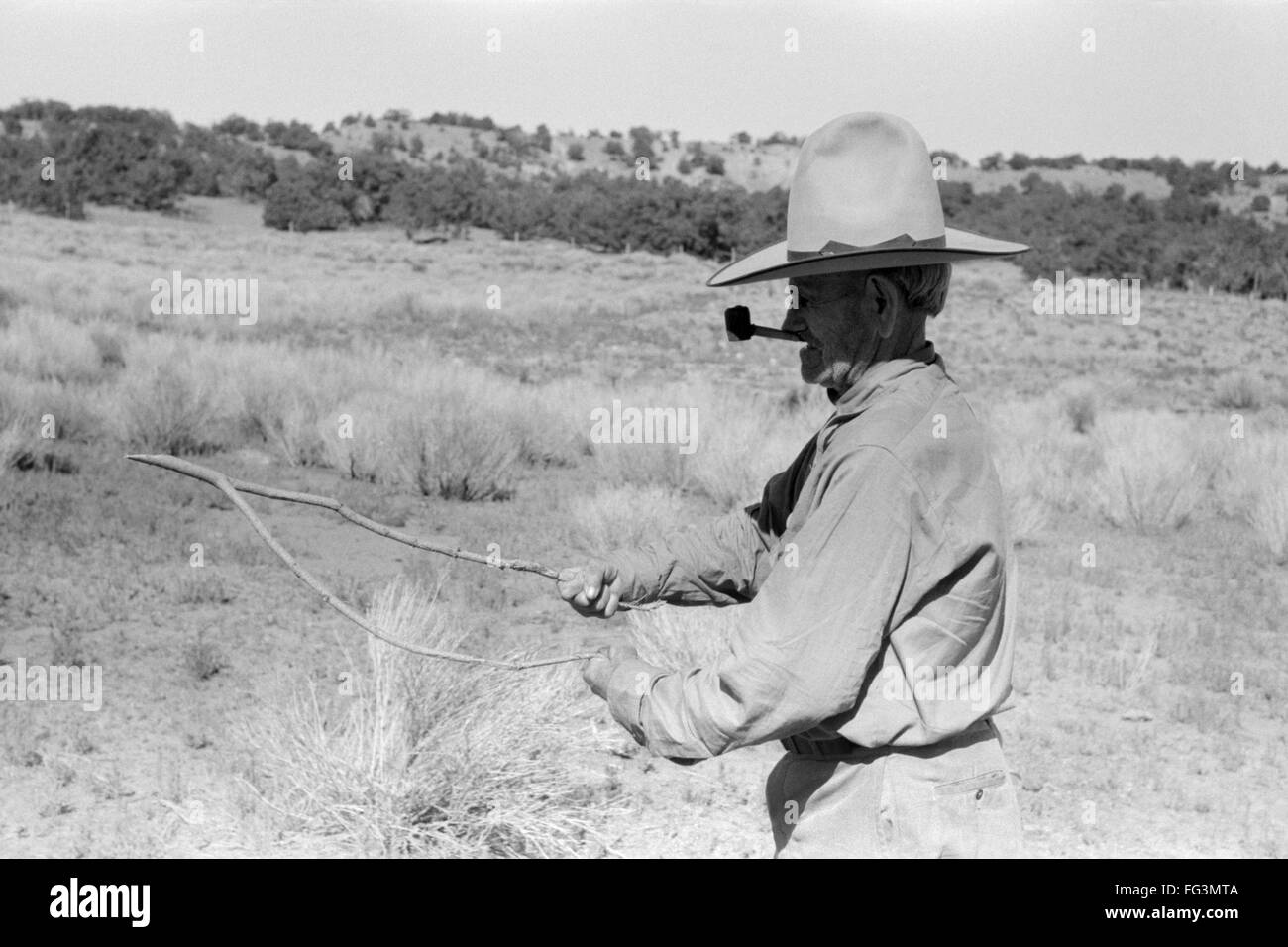 WELL WITCHING, 1940. /nA cowboy searching for water with a forked stick ...