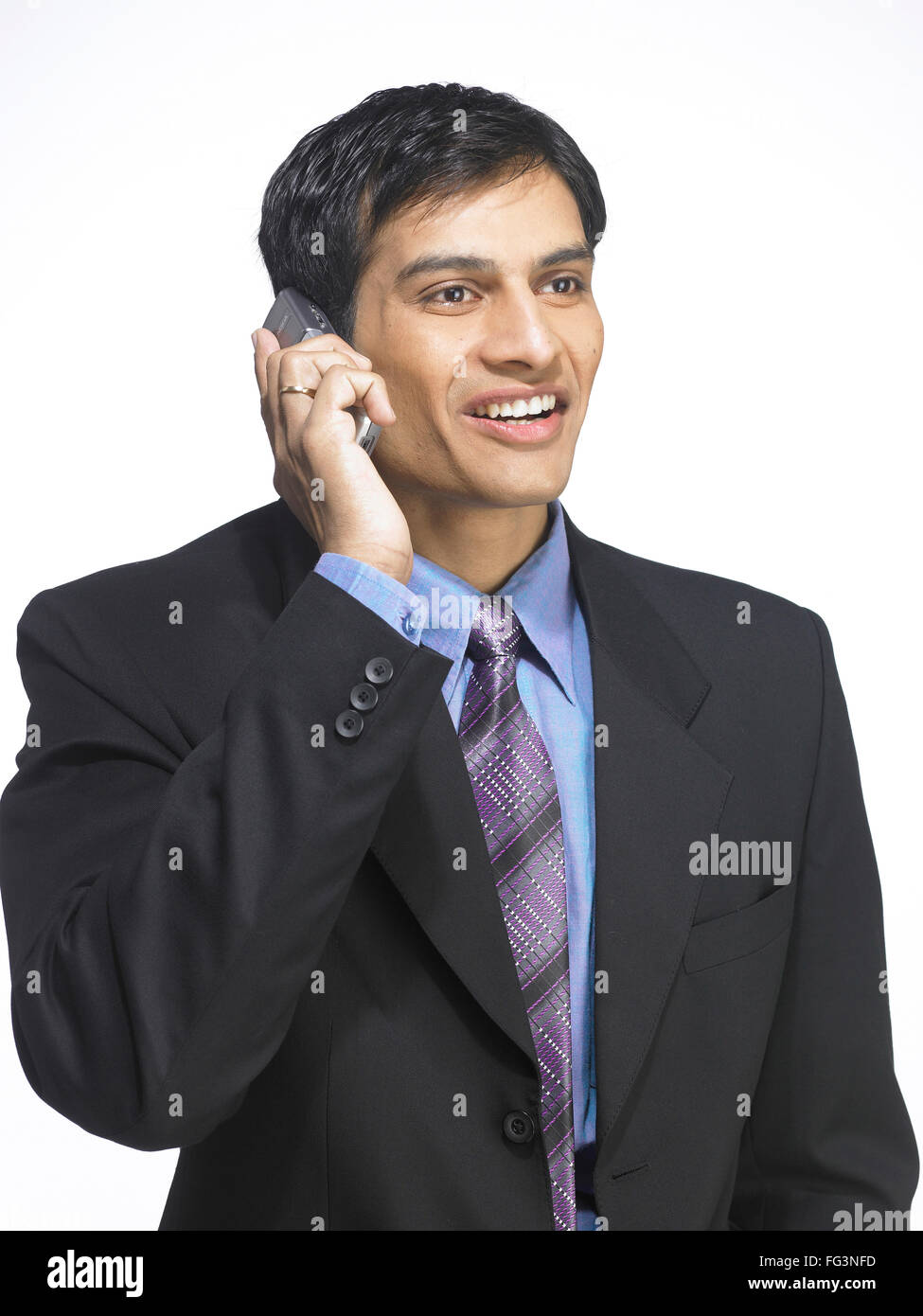 South indian man talking cell hi-res stock photography and images - Alamy