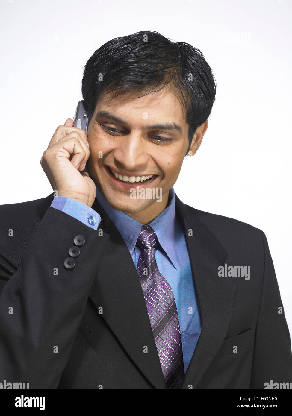 South indian man talking cell hi-res stock photography and images - Alamy