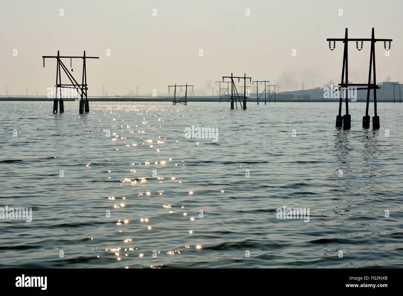 Pylons flooded by lake near Lokbatan, Azerbaijan. A recently flooded ...