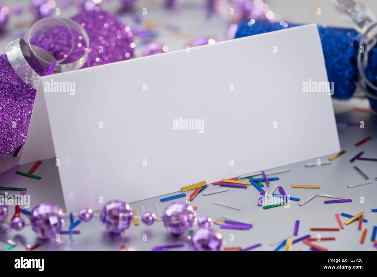 Place card, confetti and ribbons Stock Photo - Alamy