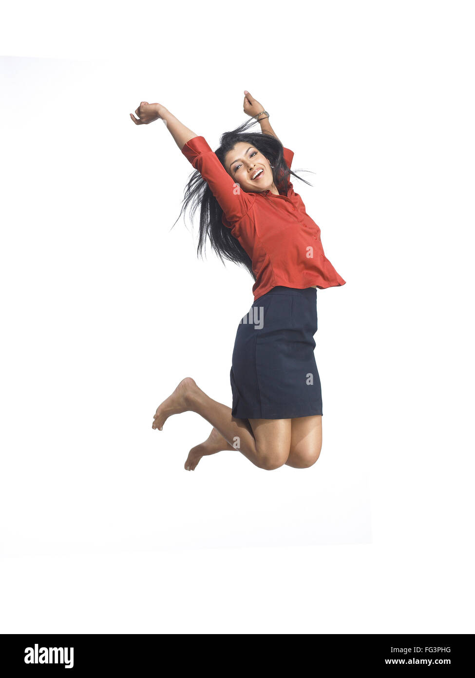 South Asian Indian executive woman jumping with joy MR Stock Photo - Alamy