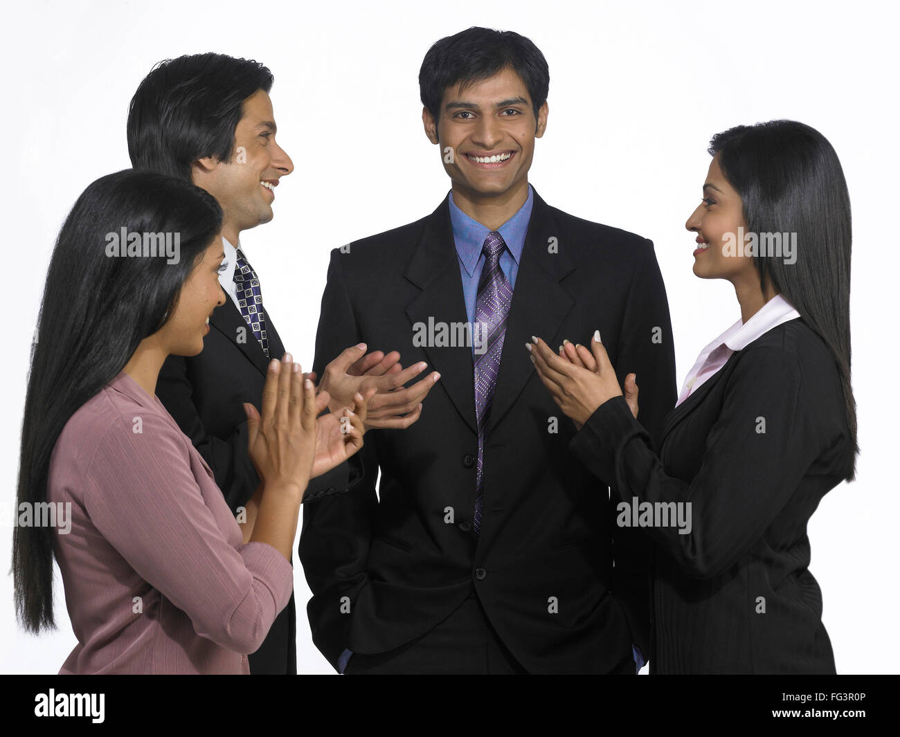 Indian business people standing clapping hi-res stock photography and ...