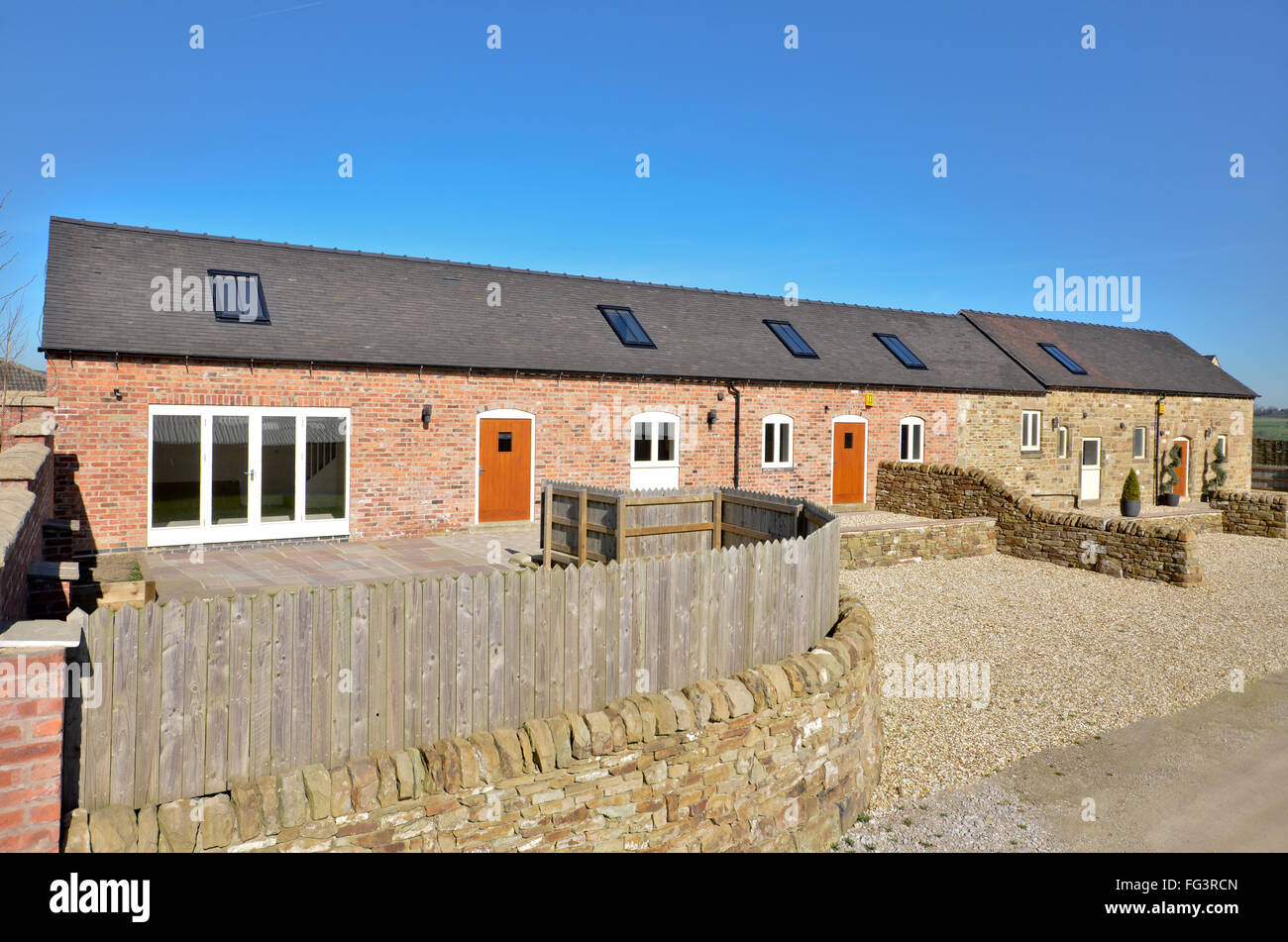 Retirement bungalows from barn conversion Stock Photo - Alamy