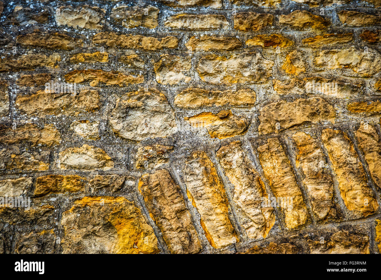 An old, weathered, aged, Stone, brick, rock wall with texture and ...