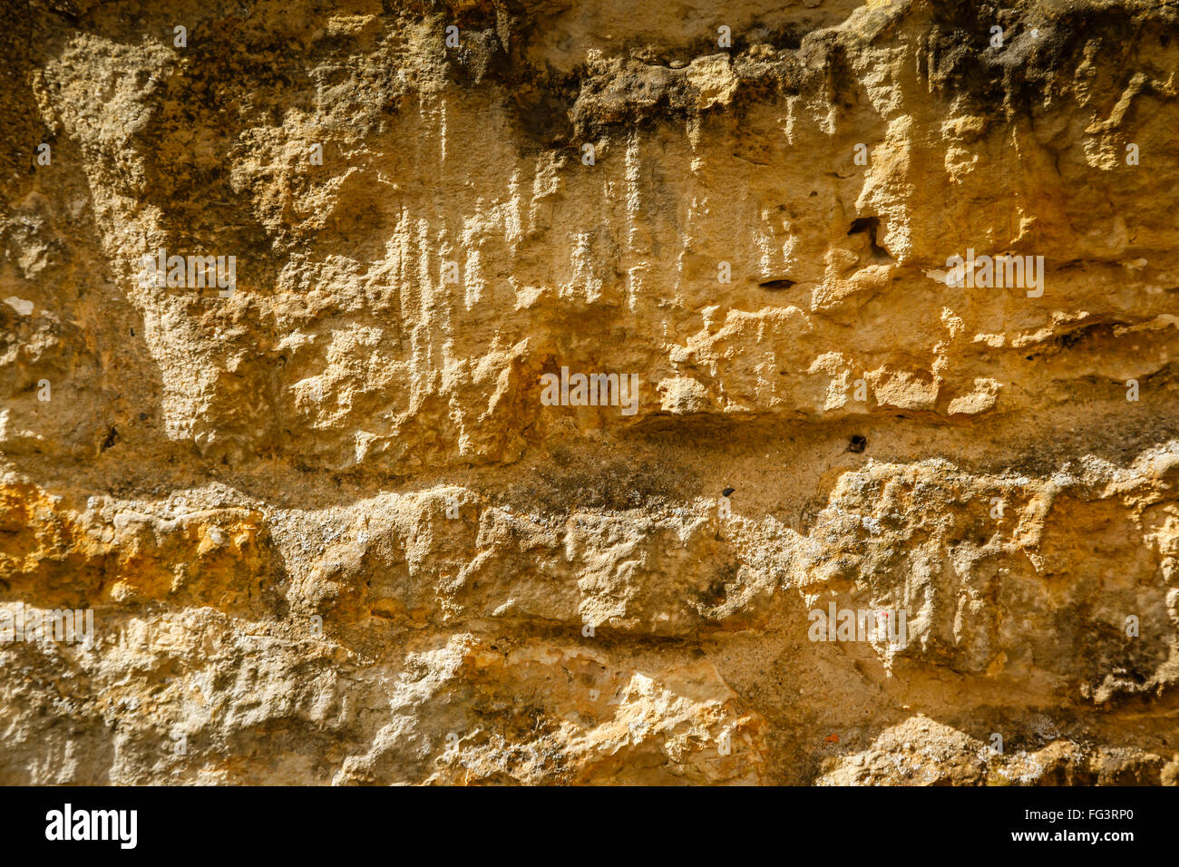 An old, weathered, aged, Stone, brick, rock wall with texture and ...