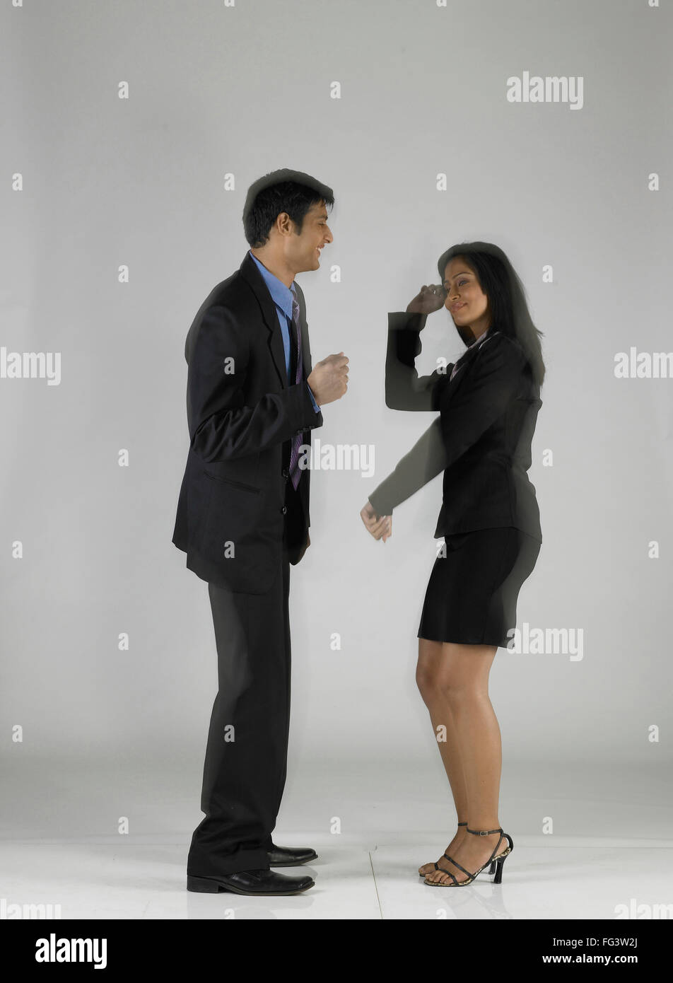 South Asian Indian executive man and woman dancing MR Stock Photo - Alamy